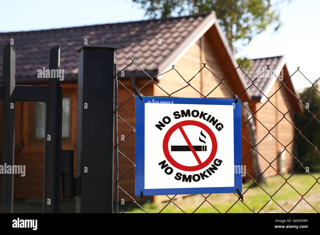 No Smoking sign on fence outdoors. Prohibition Stock Photo - Alamy