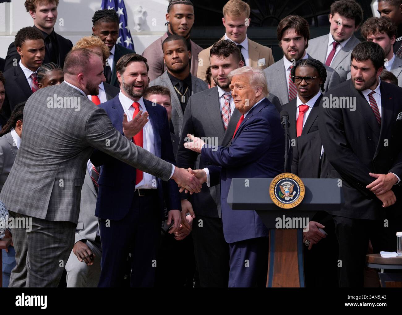 President Donald Trump, at podium from right, and Vice President JD ...