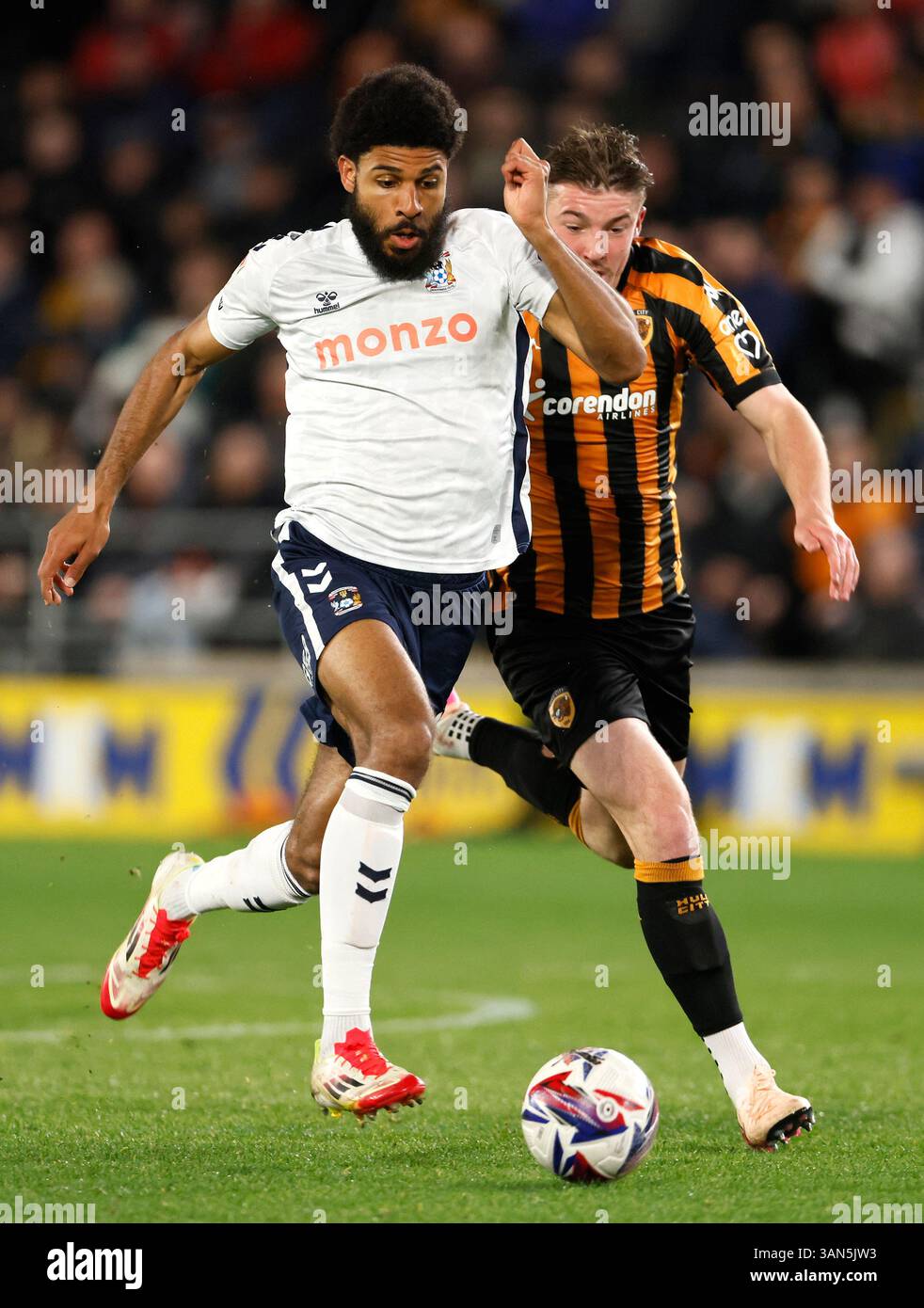 Coventry City's Ellis Simms (left) in action during the Sky Bet ...