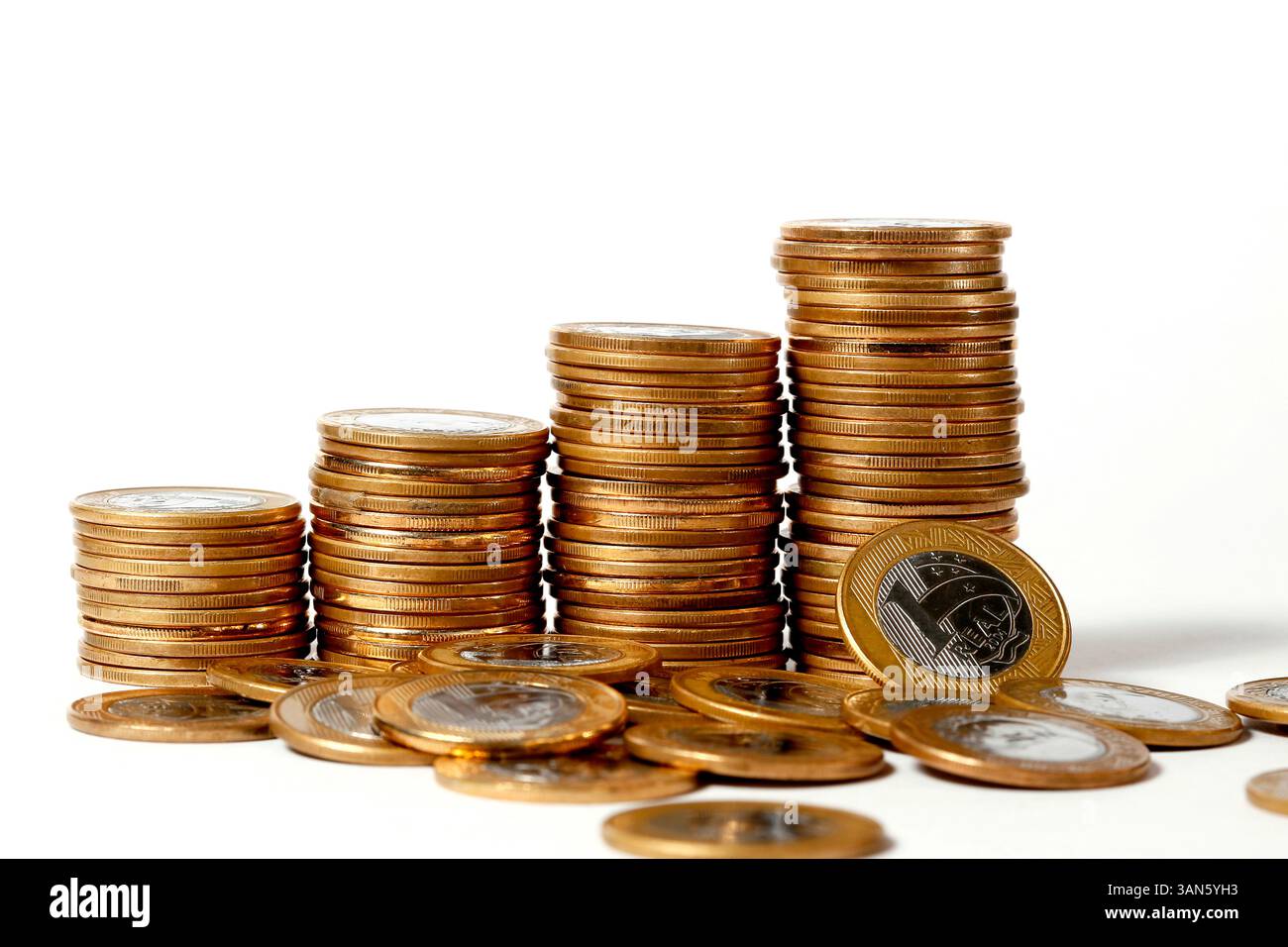 Falling coins in stack hi-res stock photography and images - Alamy
