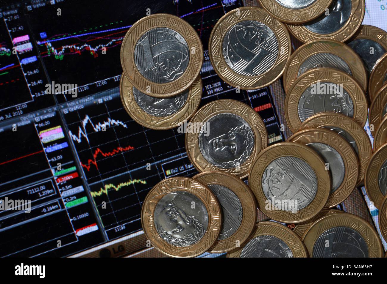 Stock market graph with brazilian coins Stock Photo - Alamy