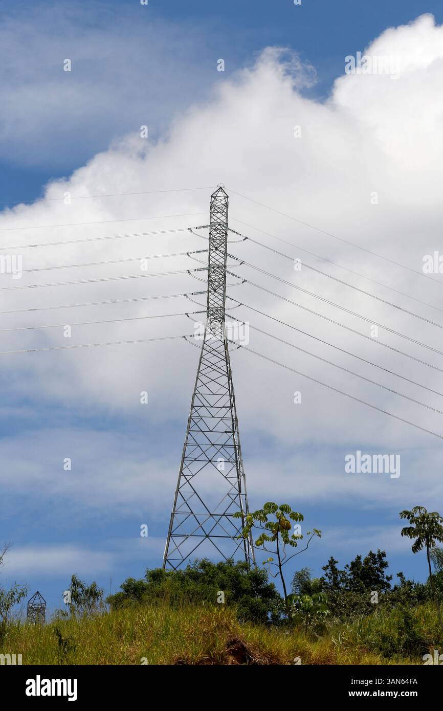 transmission energy tower with clouds and blue sky in background Stock ...