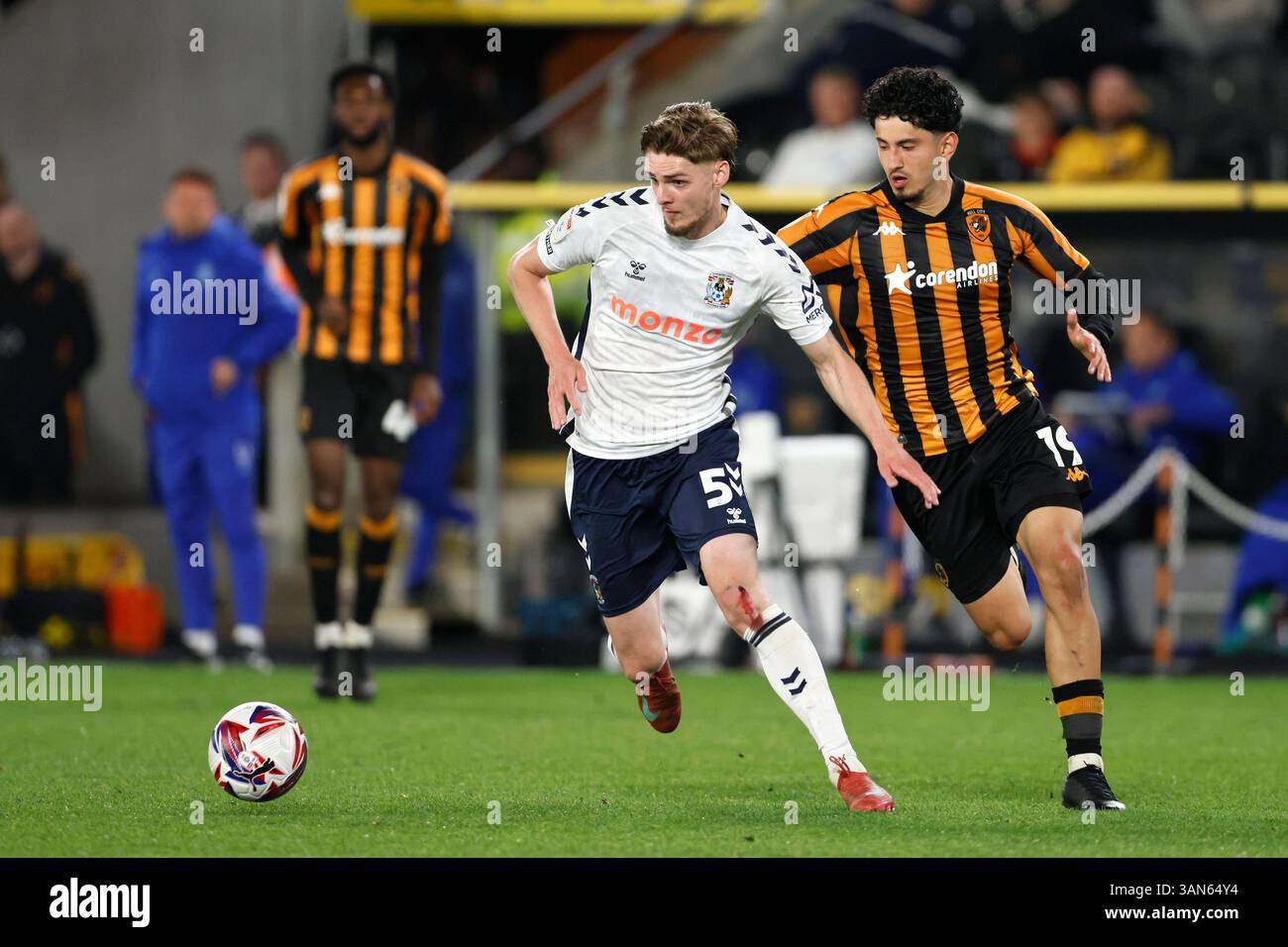 Coventry City's Jack Rudoni (left) and Hull City's Steven Alzate battle ...