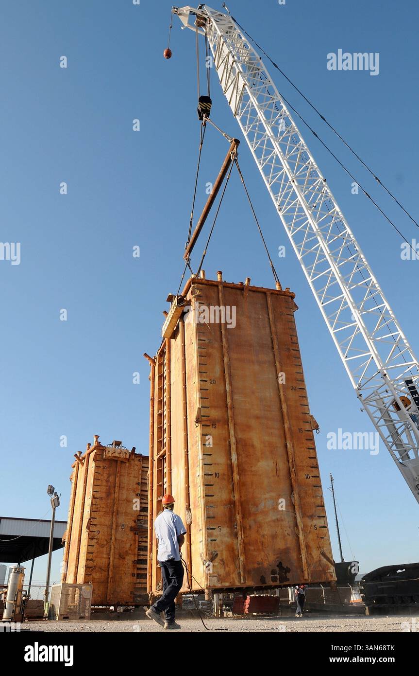 Apr 26, 2010 - Port Fourchon, Louisiana, U.S. - A crane lifts the base ...