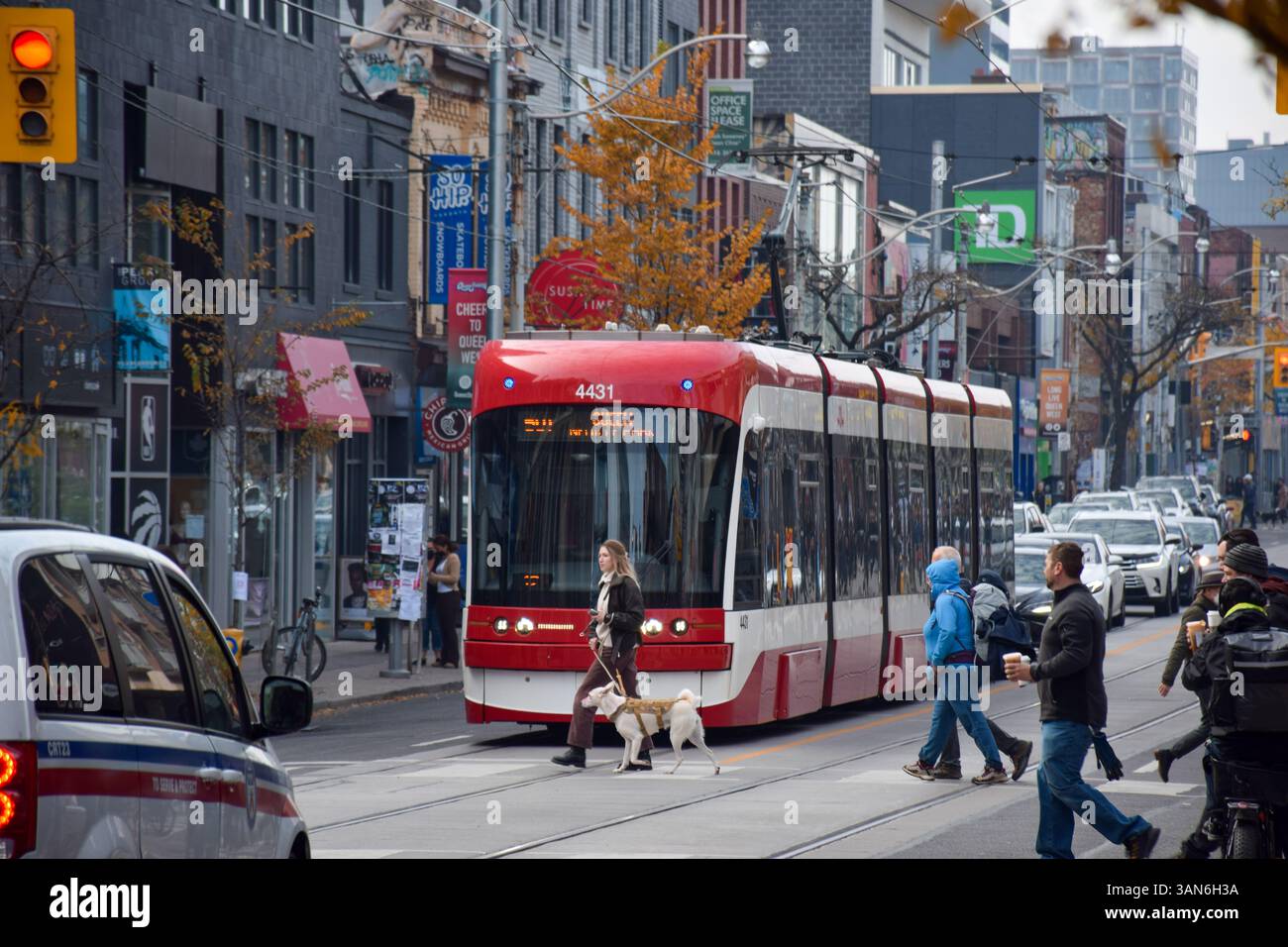 October 30, 2022 - Toronto, Ontario, Canada: Pedestrians crossing Queen ...