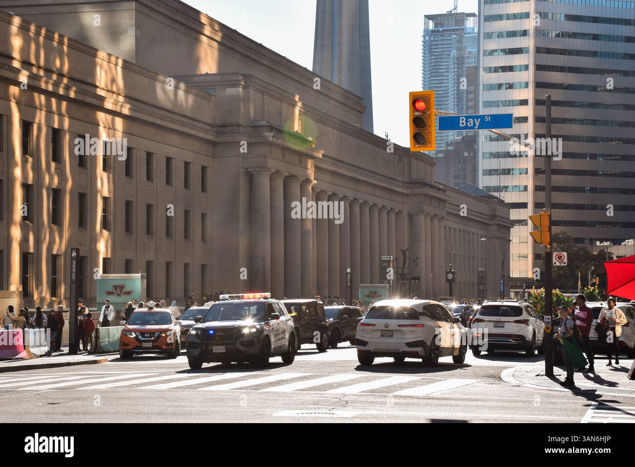 Police car turning at Bay and Front Street in front of Union Station in ...