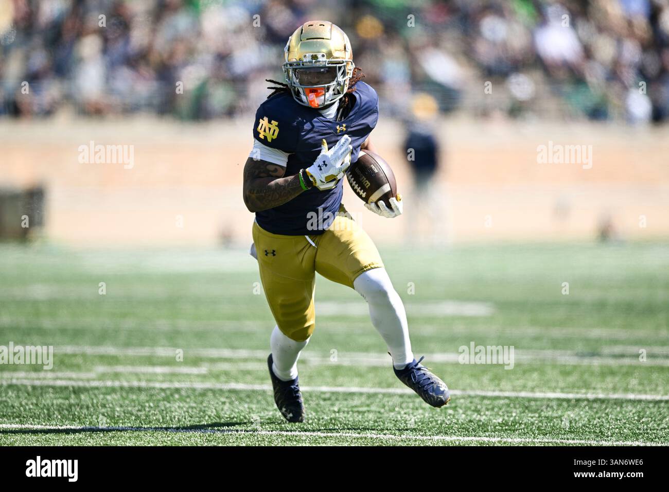 SOUTH BEND, IN - APRIL 12: Notre Dame RB Gi'Bran Payne (3) runs with ...