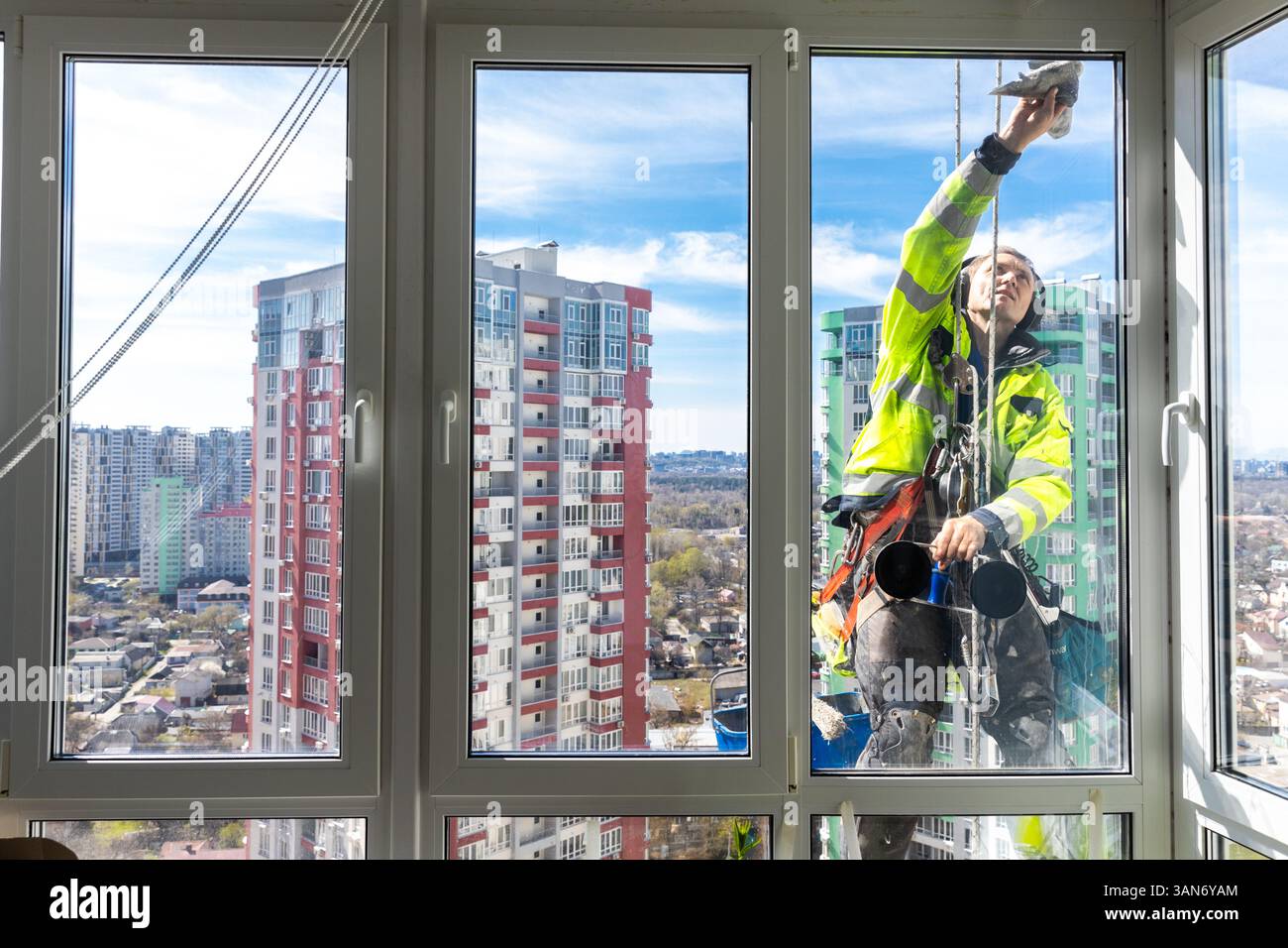 Window Cleaner Operations on a High-Rise Building with a Breathtaking ...