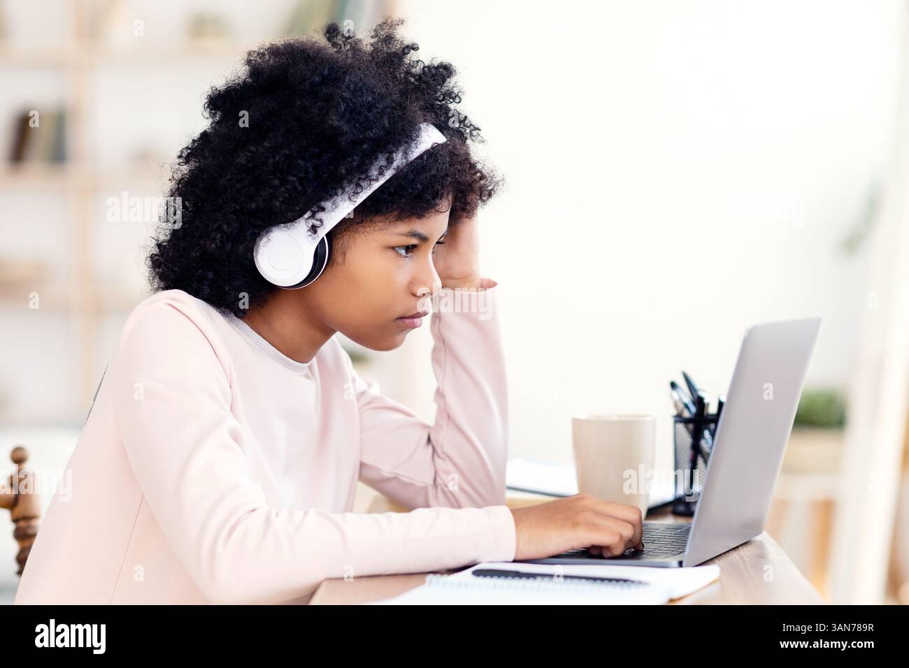 Kid Girl At Laptop Computer Studying Doing Homework At Home Stock Photo ...