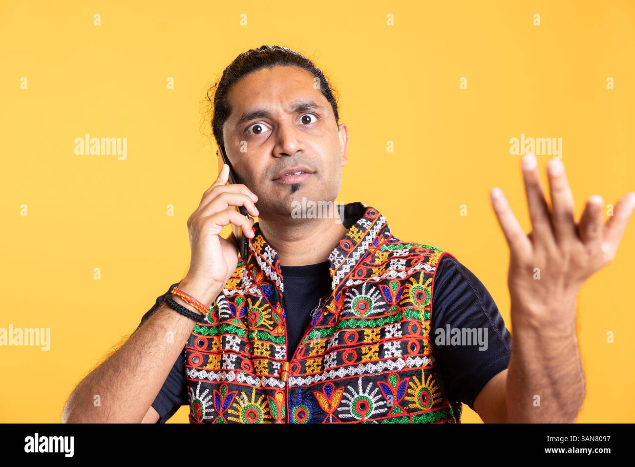 Portrait of dumbstruck man confused about friend over stupid arguments ...