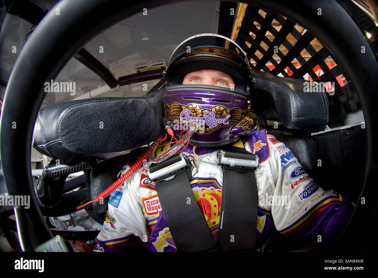 Jamie McMurray straps in before the running of the Citizens Bank 400 ...