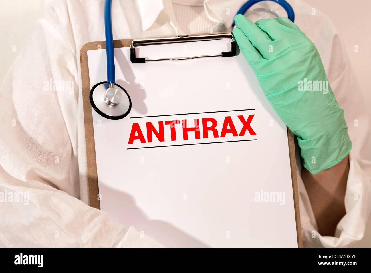 On the business card text ANTHRAX, next to red capsules Stock Photo - Alamy