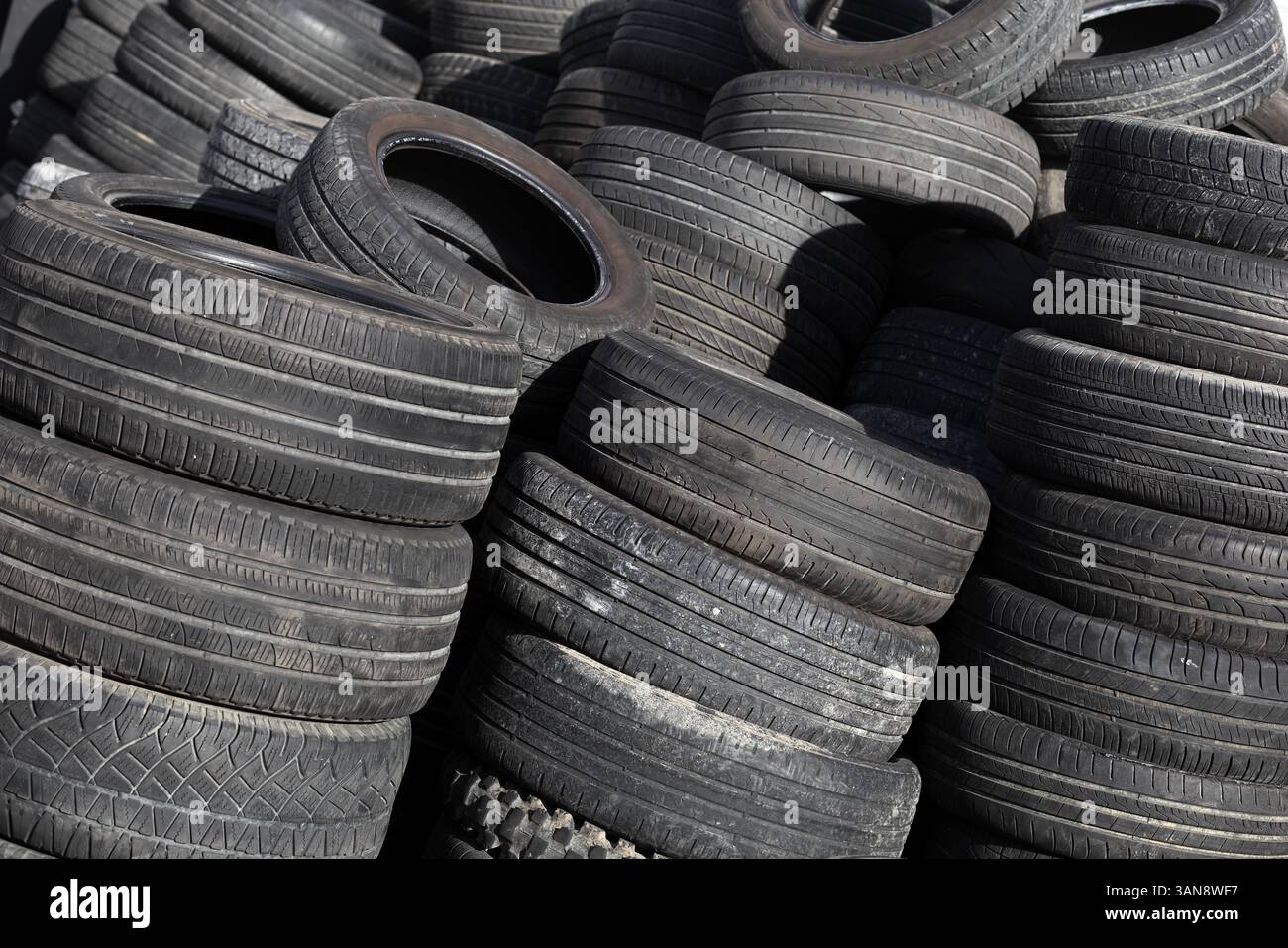 Old used tires tyres heap on disposal recycling scrap depot Stock Photo ...