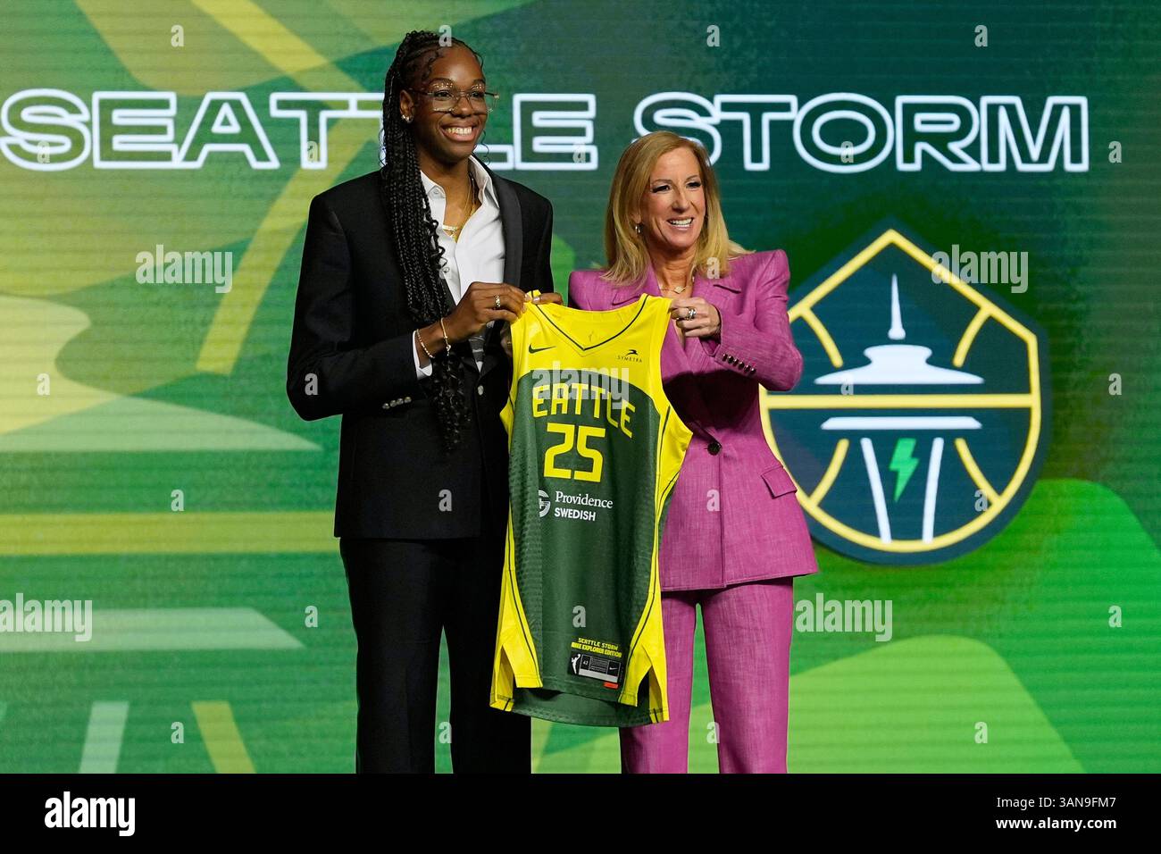 Dominique Malonga, left, poses with WNBA commissioner Cathy Engelbert ...
