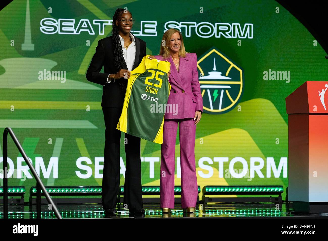 Dominique Malonga, left, poses with WNBA commissioner Cathy Engelbert ...