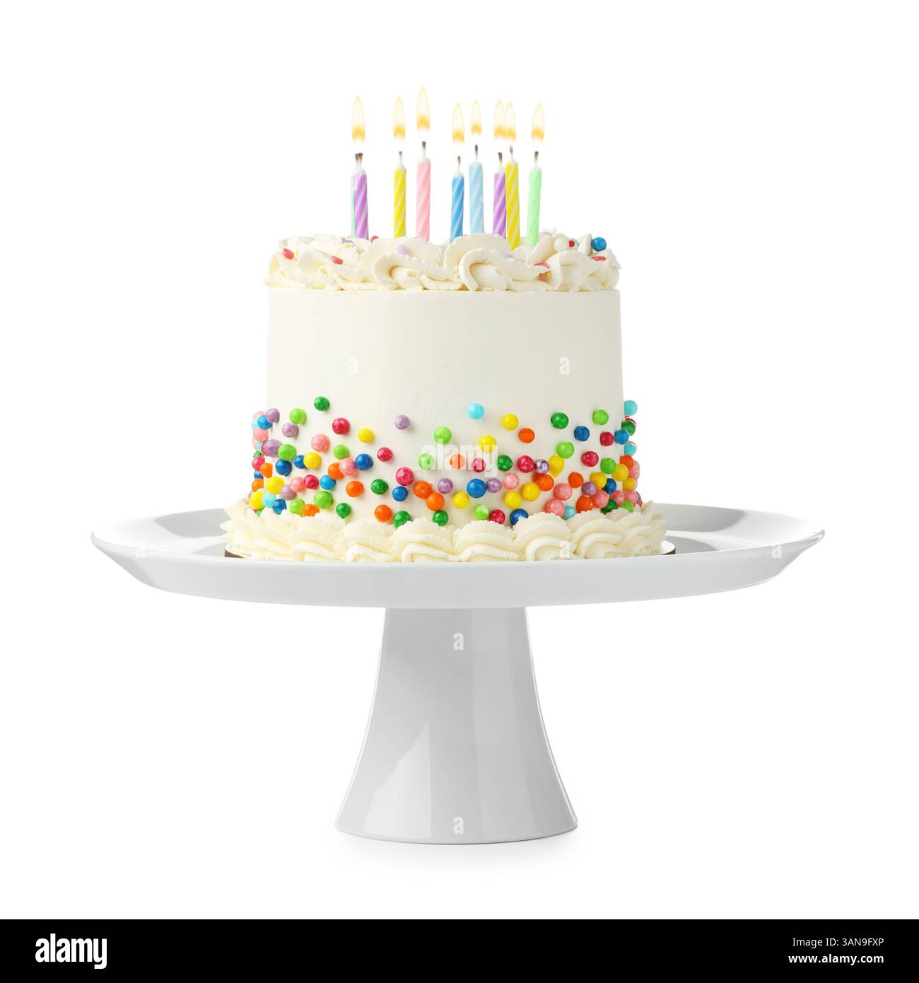 Delicious bento cake with colorful sprinkles and burning candles ...