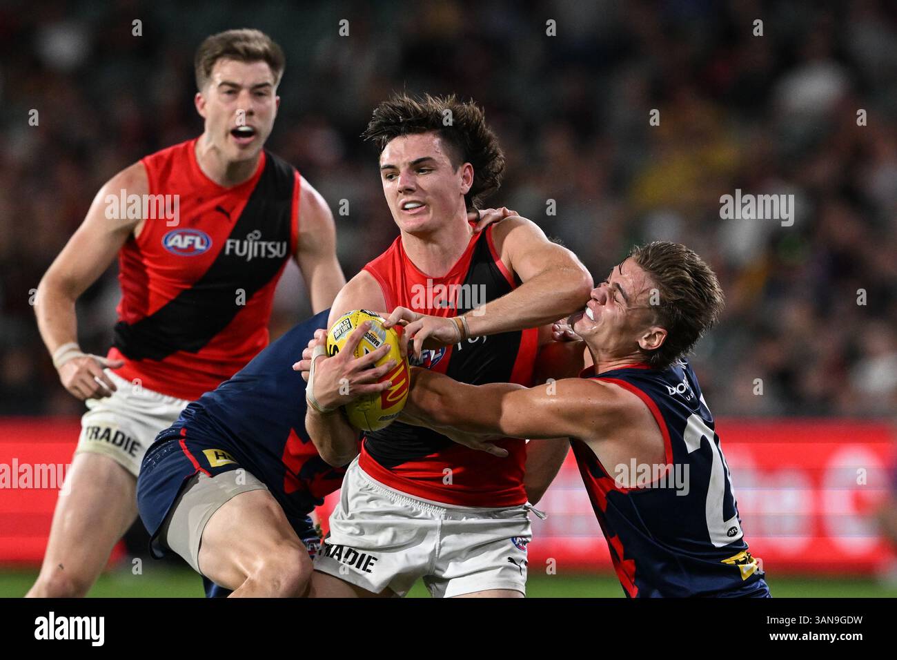 Adelaide, Australia. 12th Apr, 2025. Trent Rivers of Melbourne gets an ...