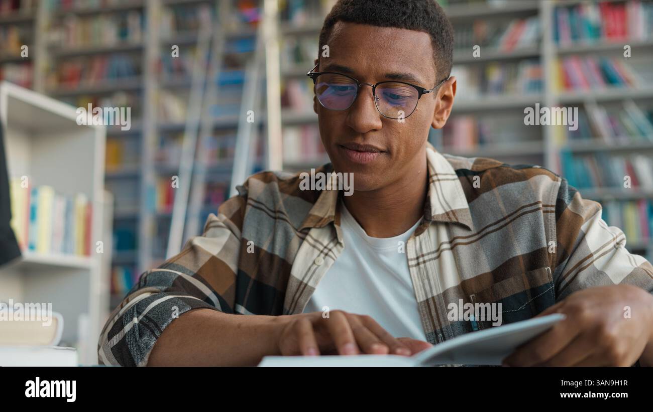 African American man male guy student pupil learner put on glasses open ...
