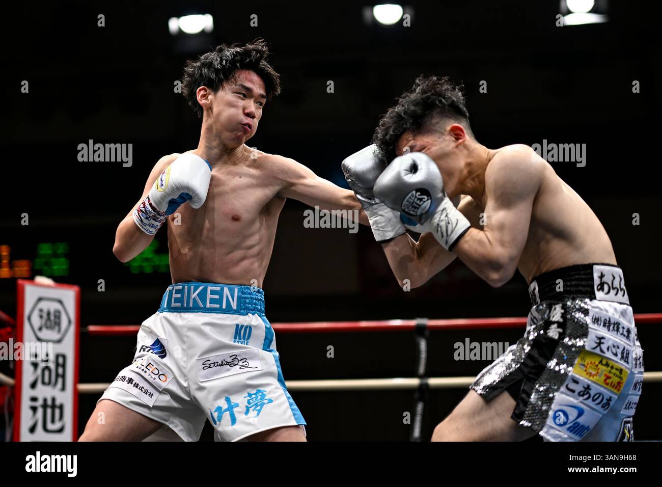 Tokyo, Japan. 8th Apr, 2025. Challenger Kyosuke Takami (white gloves) hits champion Toshiki ...
