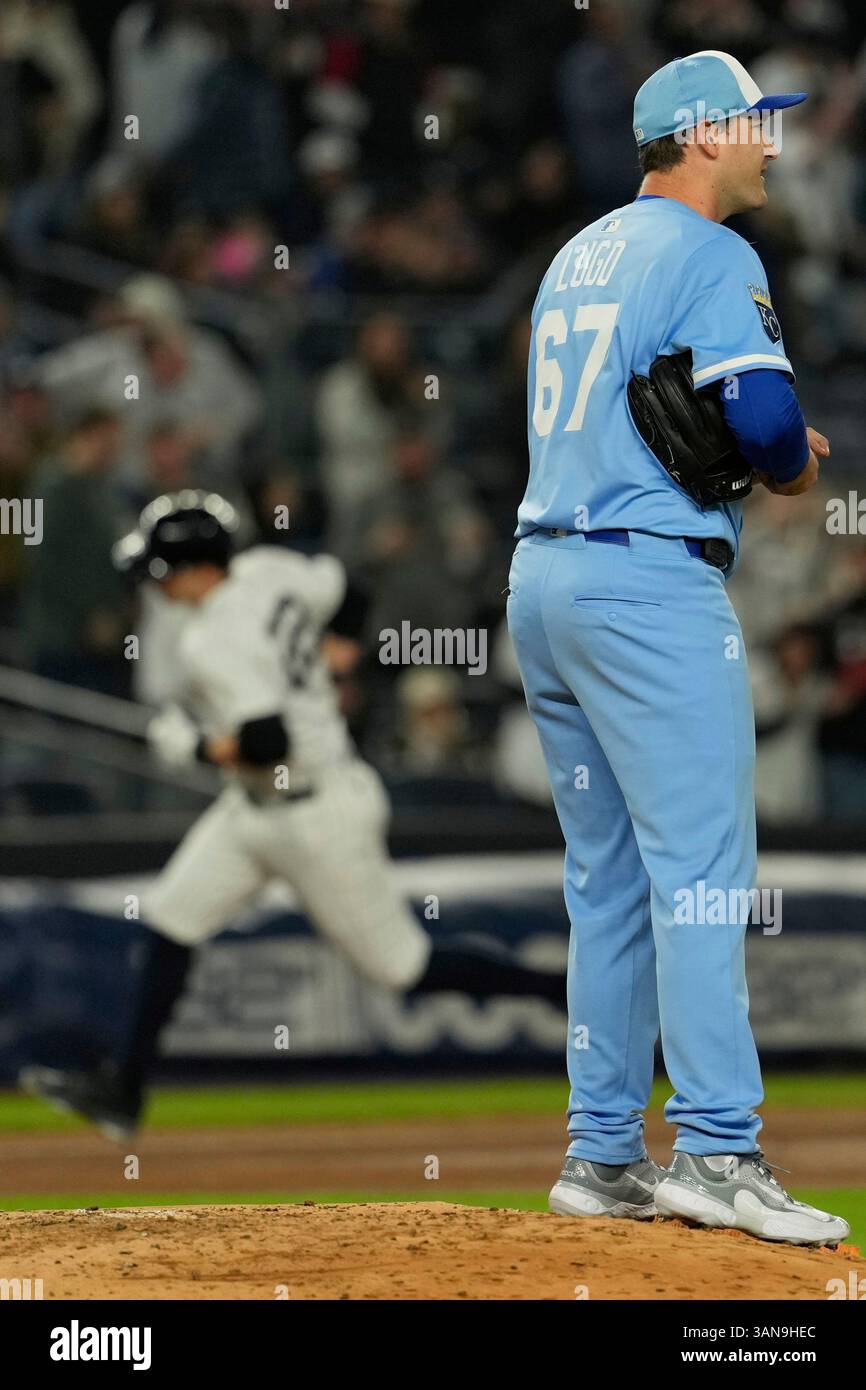 Kansas City Royals pitcher Seth Lugo, right, reacts after giving up a ...