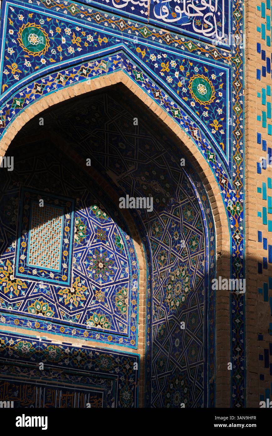 Close up, detail view of the complex blue tile design of a front facade ...