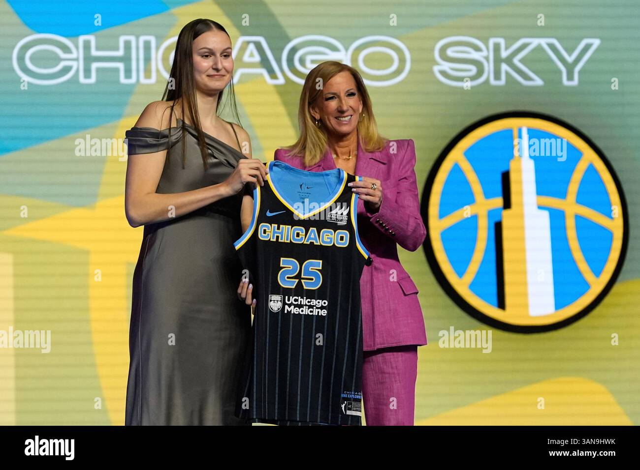 Ajsa Sivka, left, poses for a photo with WNBA commissioner Cathy ...