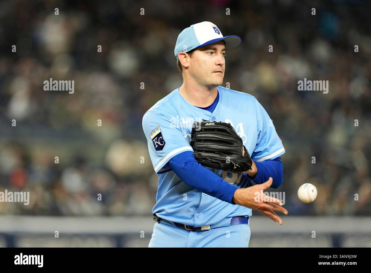 Kansas City Royals pitcher Seth Lugo throws the ball to first base for ...