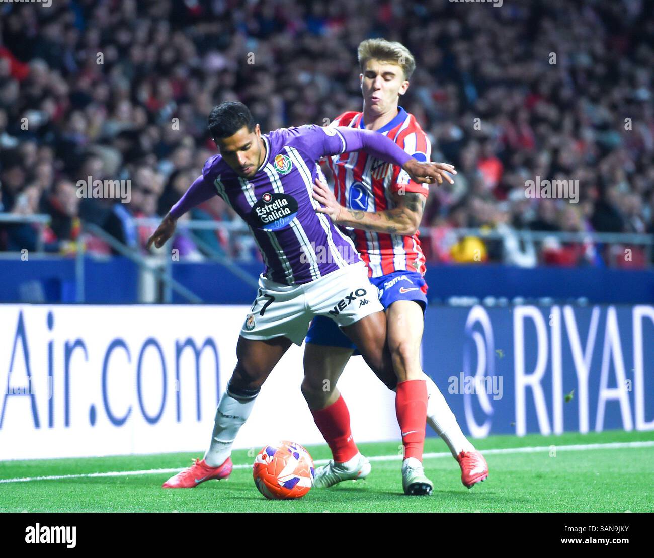 Madrid, Spain. 14th Apr, 2025. Pablo Barrios (R) of Atletico de Madrid ...
