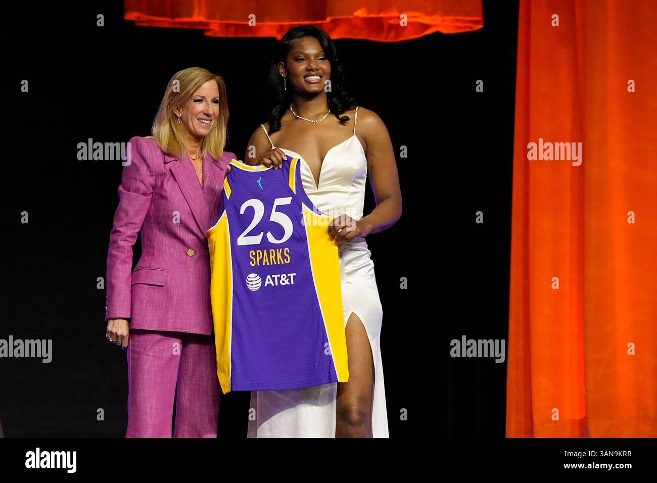 South Carolina's Sania Feagin, right, poses for a photo with WNBA commissioner Cathy Engelbert ...