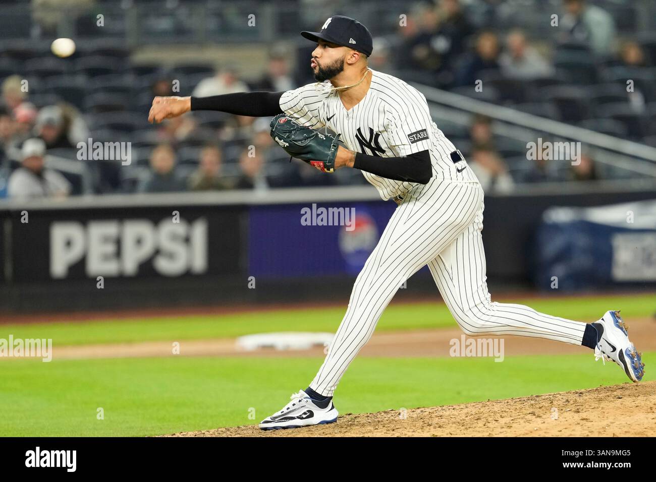 New York Yankees pitcher Devin Williams throws during the ninth inning ...