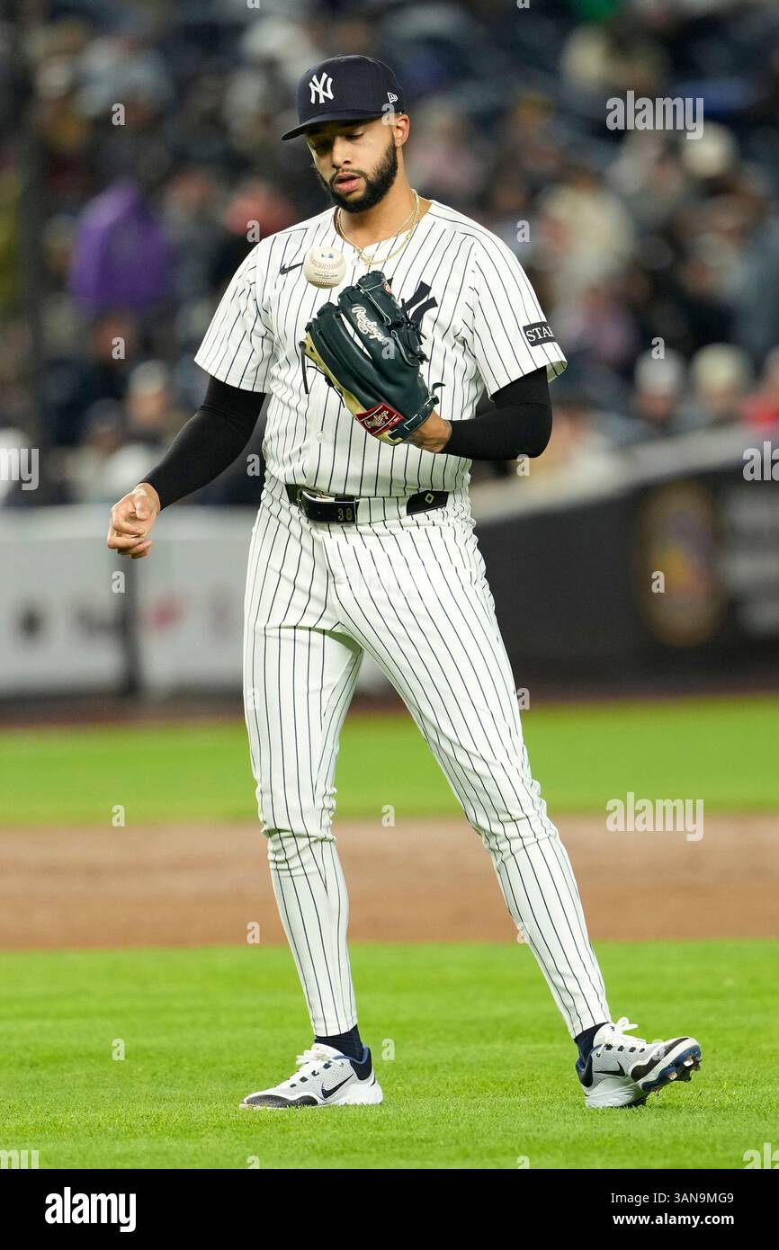 New York Yankees pitcher Devin Williams reacts during the ninth inning ...