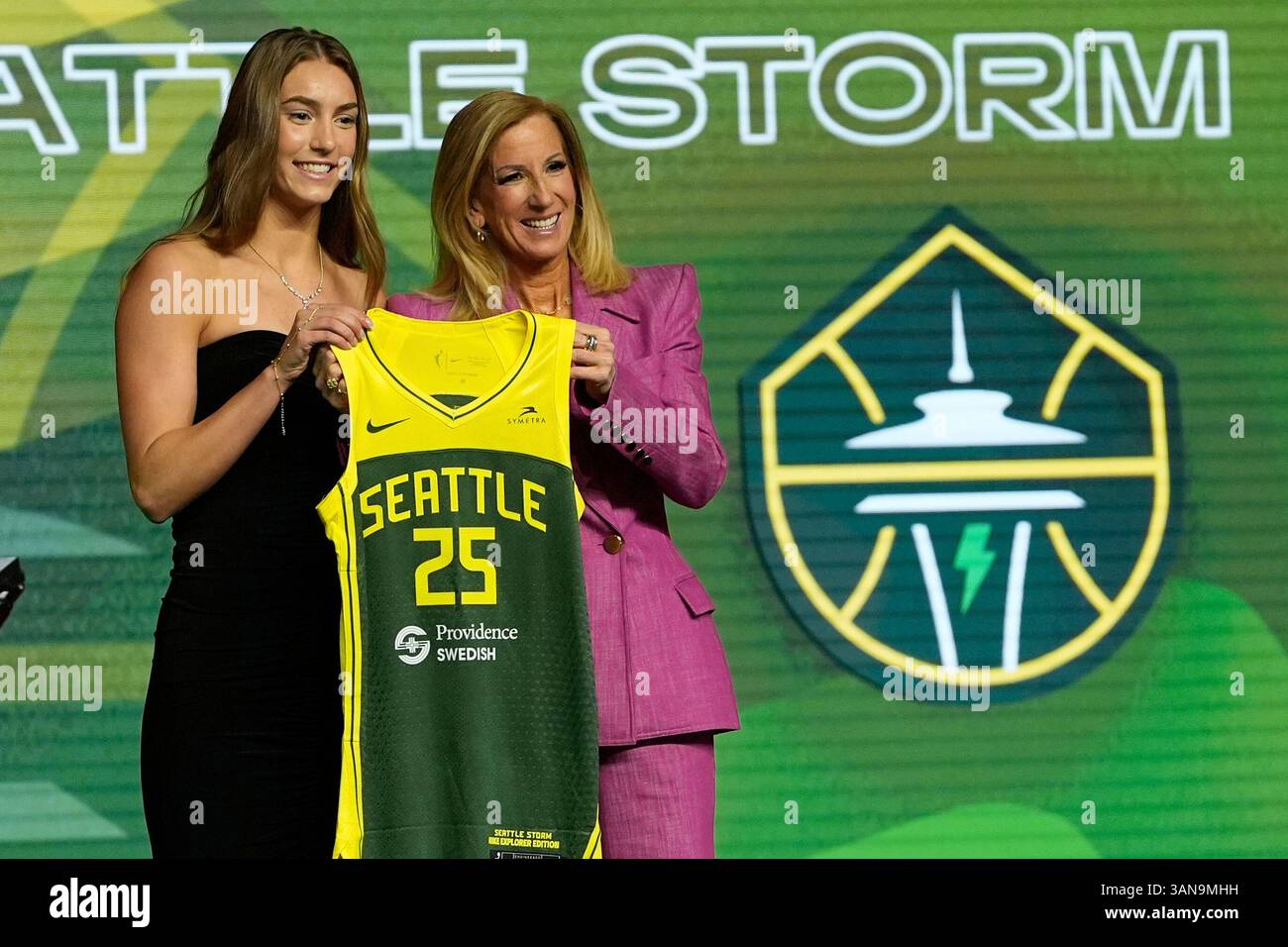Kansas State's Serena Sundell, left, poses for a photo with WNBA ...
