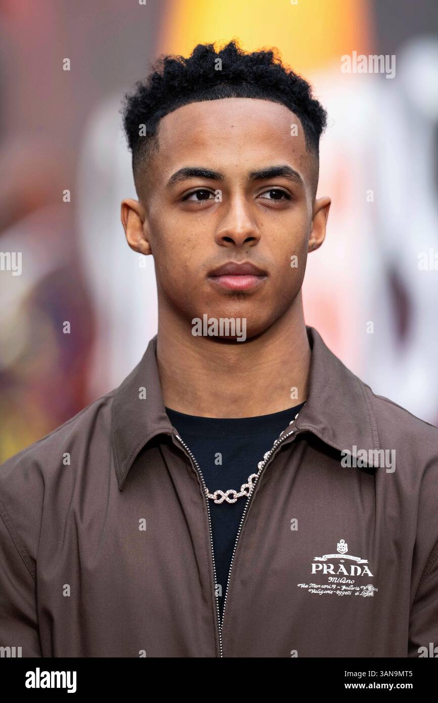 Omari Hutchinson poses for photographers upon arrival at the premiere ...
