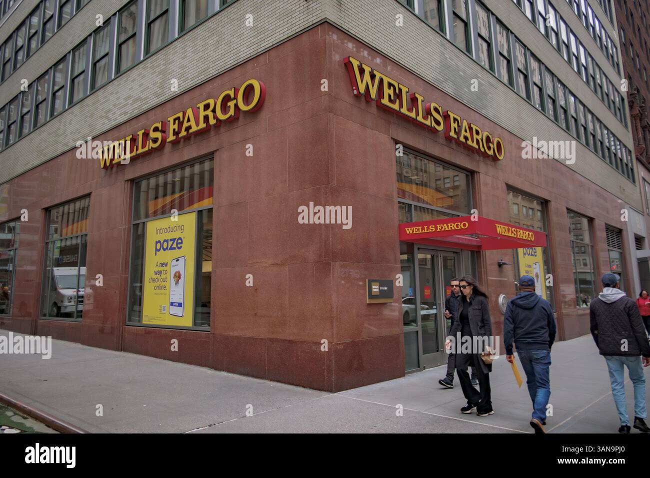 USA. 14th Apr, 2025. Sign at the entrance to a Wells Fargo bank in ...