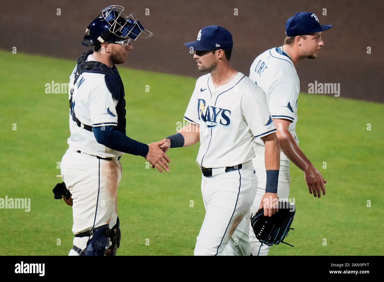 Tampa Bay Rays' Kameron Misner, center, celebrates with catcher Danny ...