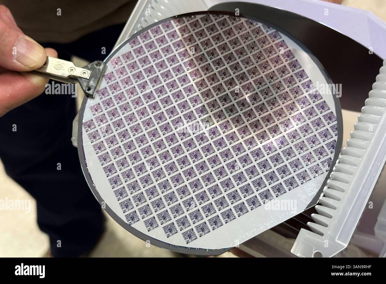 A semiconductor silicon wafer fabricated with several microchip ...