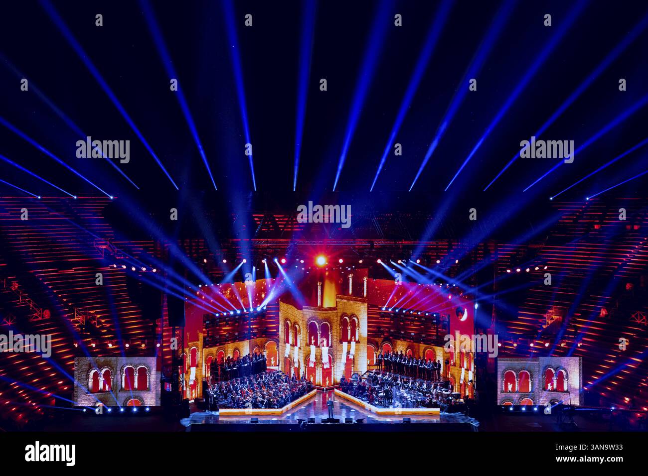Large concert stage with spectacular lights and an enthusiastic ...