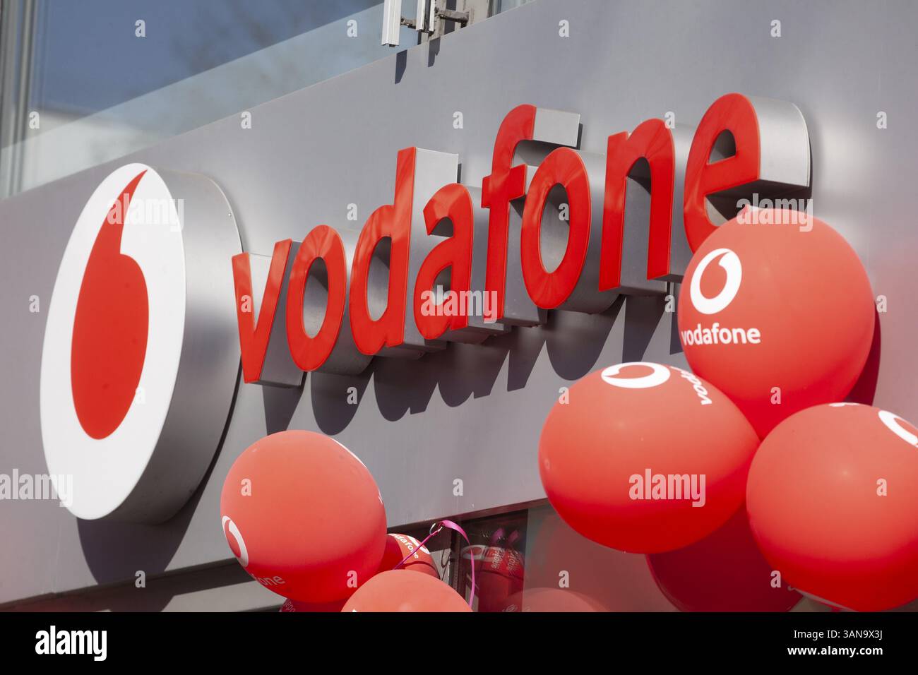 Vodafone logo on a shop, Germany, Europe Stock Photo - Alamy