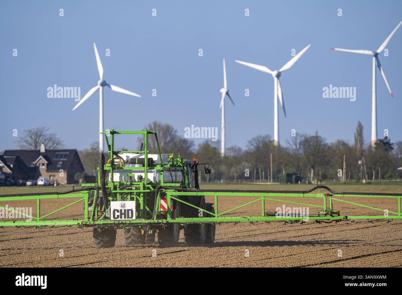 Agriculture, crop protection agent is applied to a field at the ...