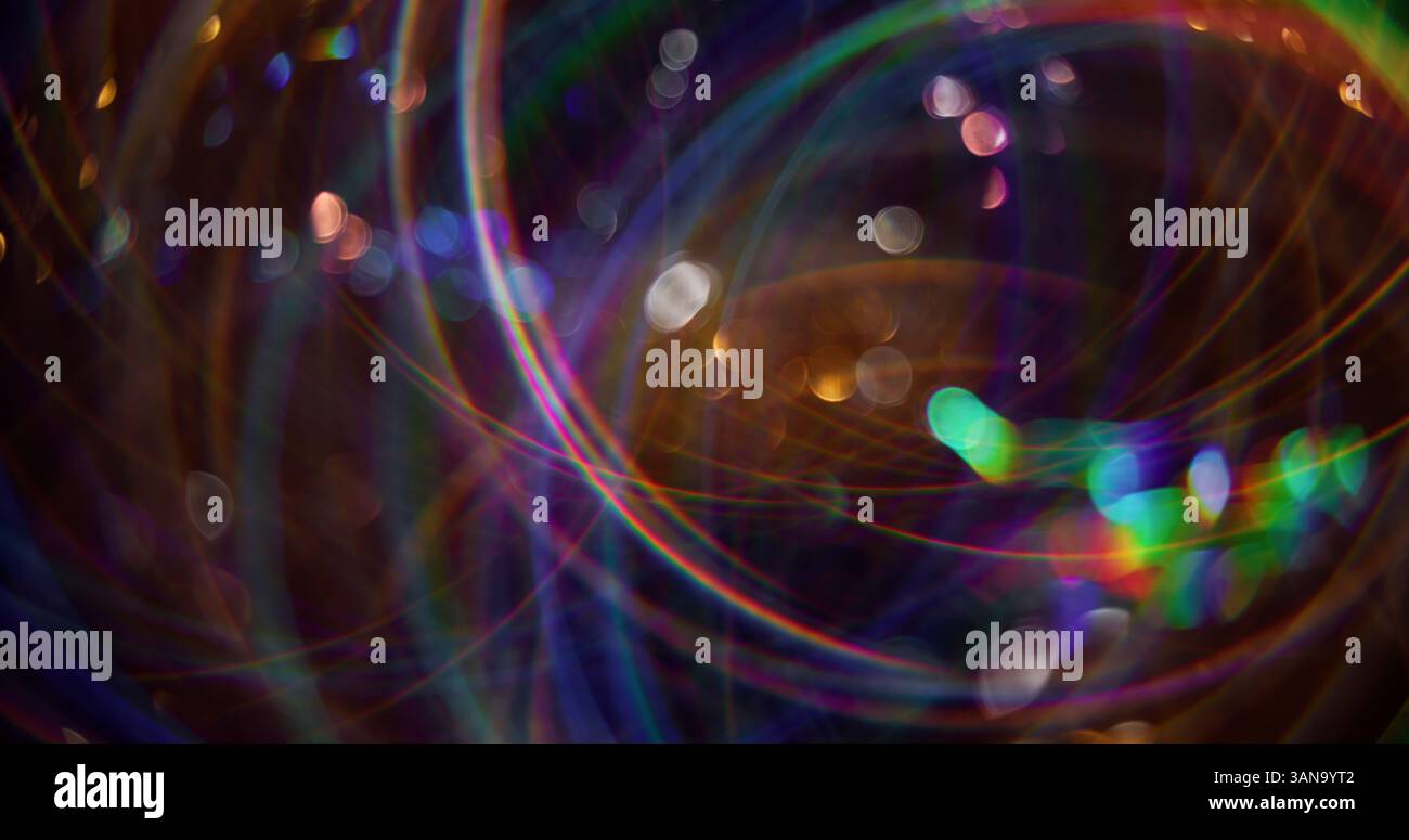 Magical Christmas. Defocused light flares. Sparkling green color particles lens flash motion on ...