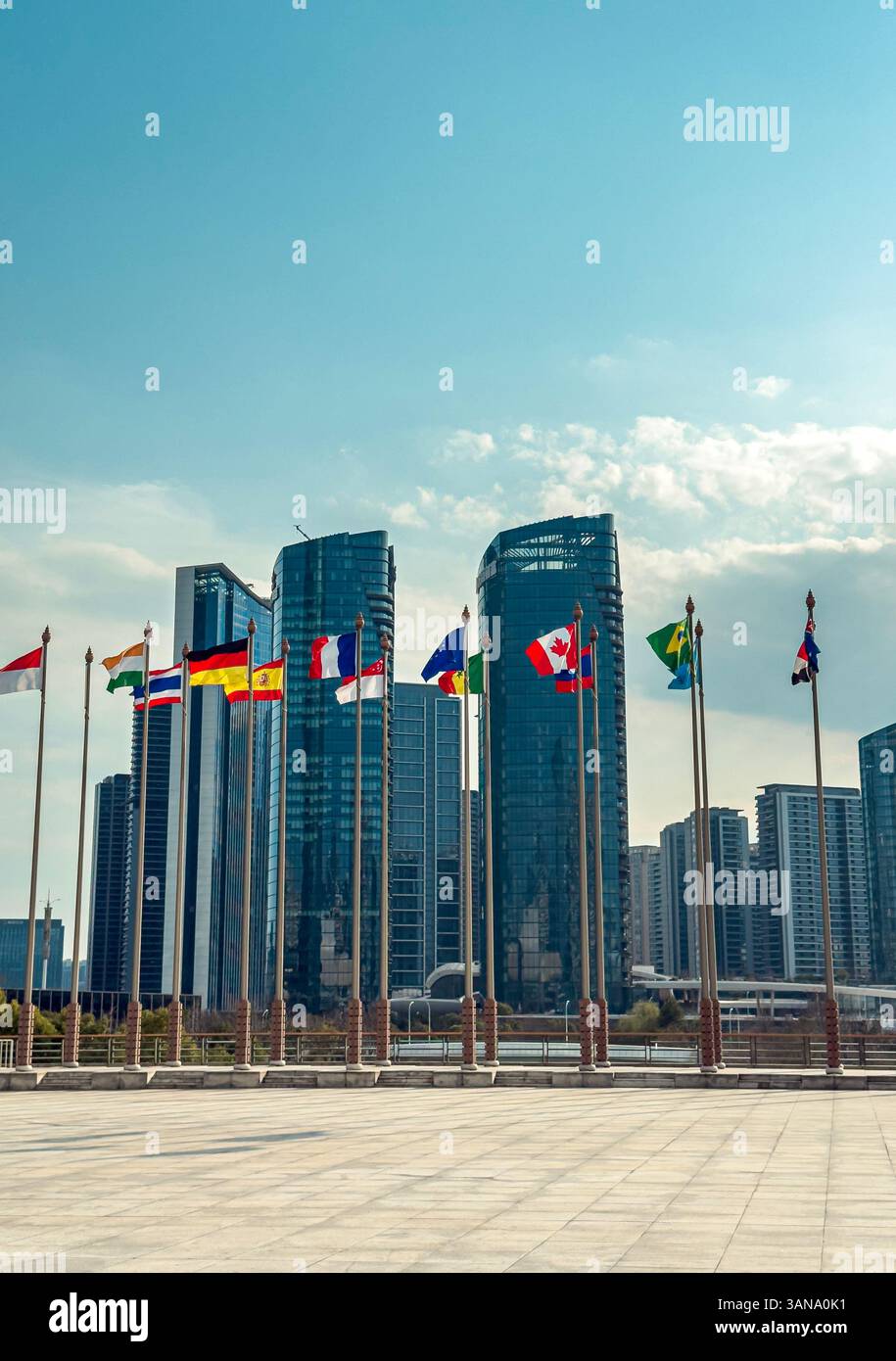 Flags of various nations wave in front of modern skyscrapers Stock ...