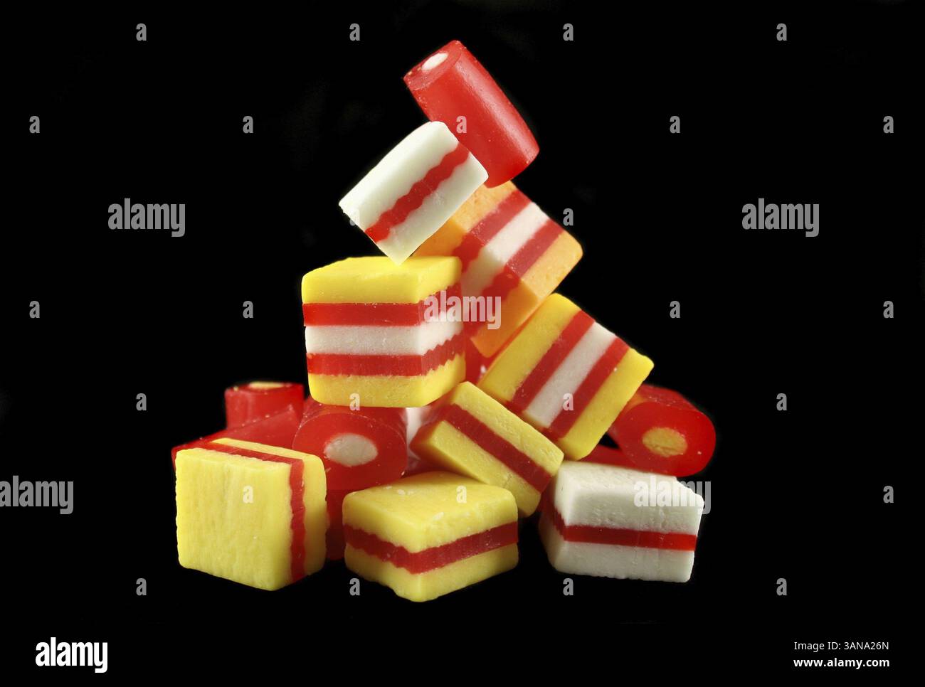 Colorful striped fruit flavored candies ready to eat Stock Photo - Alamy