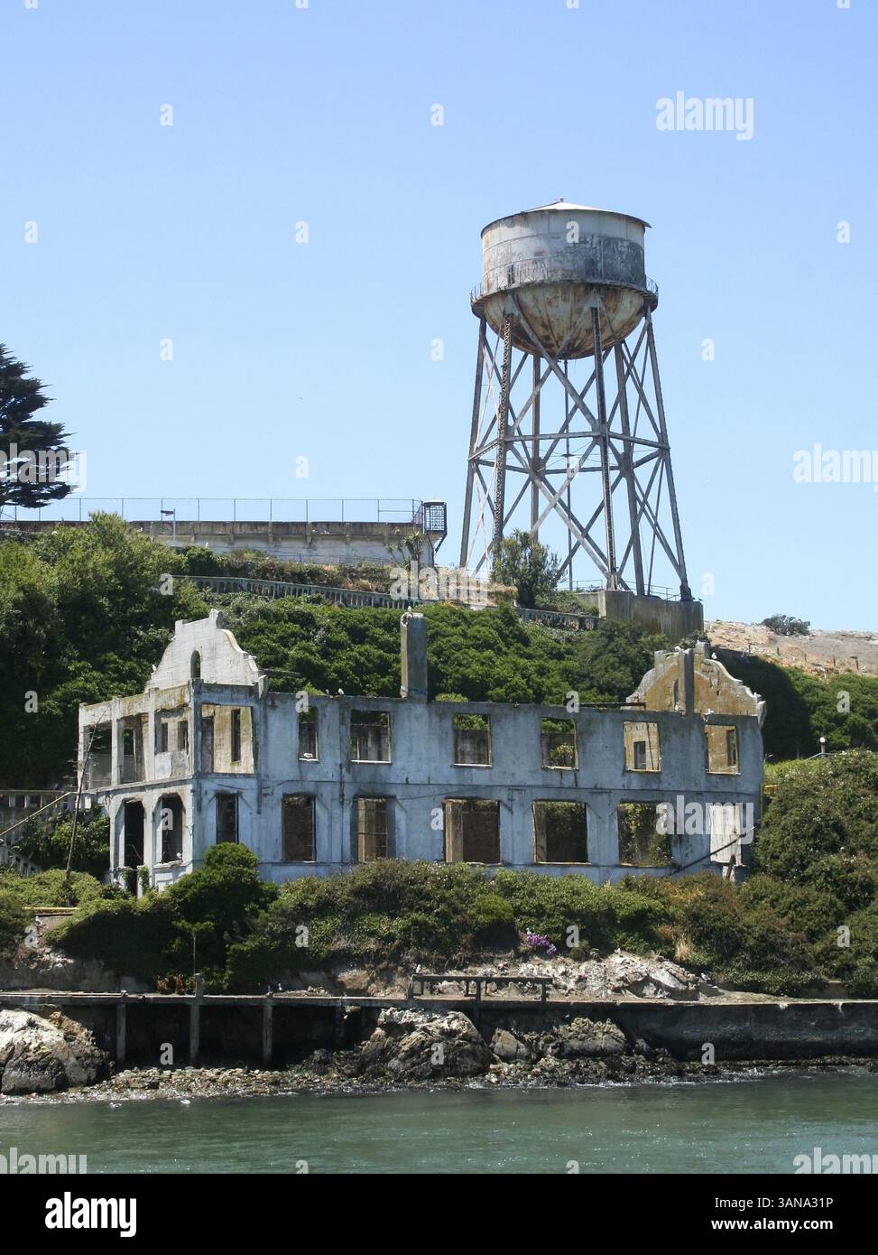 The ruins of the officers club with the water tower in the background ...