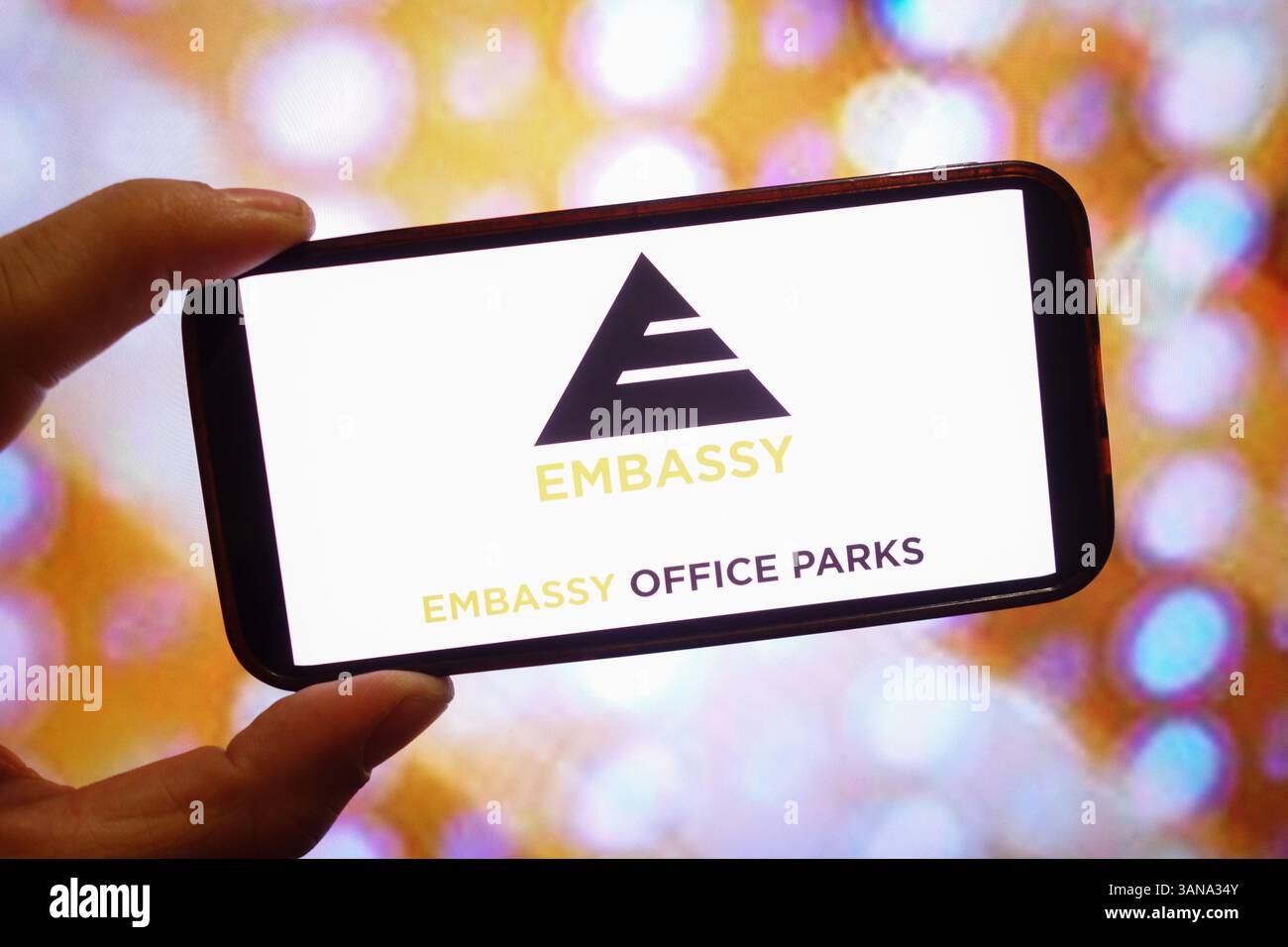 In this photo illustration, the Embassy Office Parks REIT company logo ...