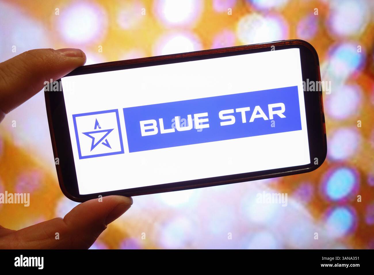 In this photo illustration, the Blue Star company logo is seen ...
