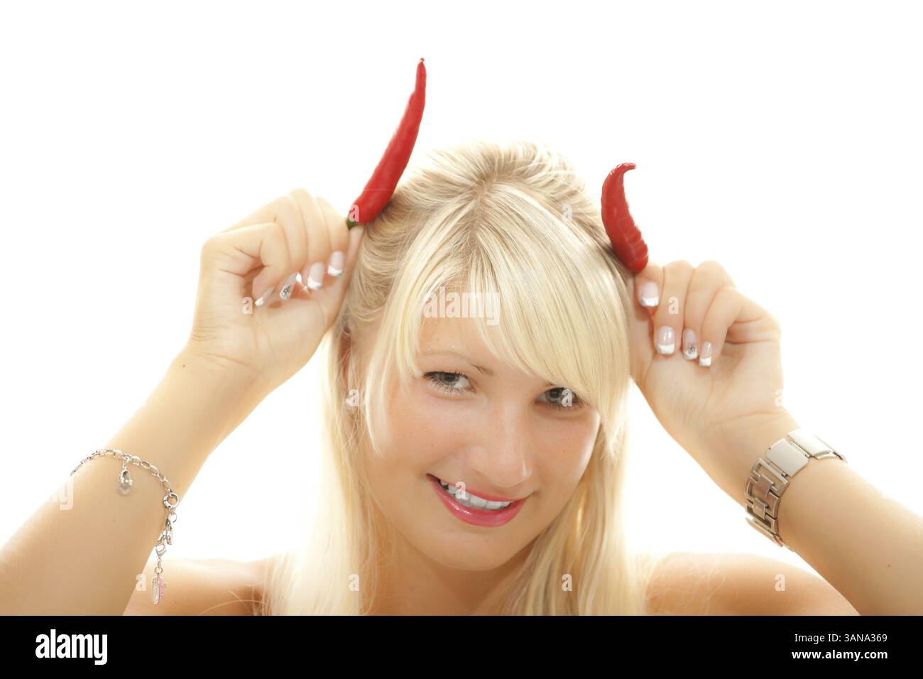 Beautiful woman with chilli Stock Photo - Alamy