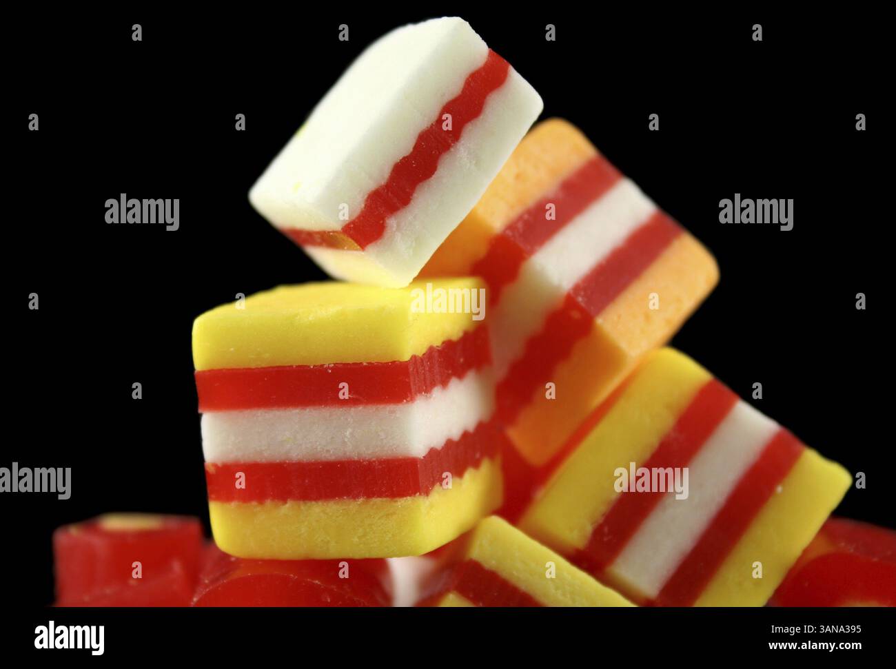 Colorful striped fruit flavored candies ready to eat Stock Photo - Alamy