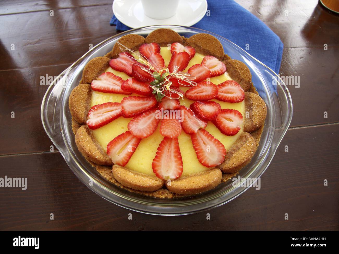 Lovely strawberry custard biscuit tart with toffee garnish ready to ...