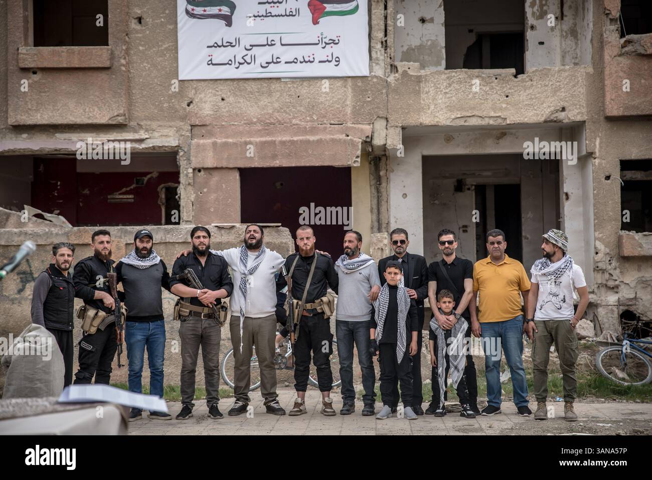 Damascus, Syria. 28th Mar, 2025. Activists and security officials pose ...