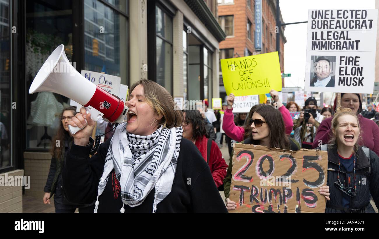FILE - Community organizer Emerson Wolfe leads a march hosted by ...